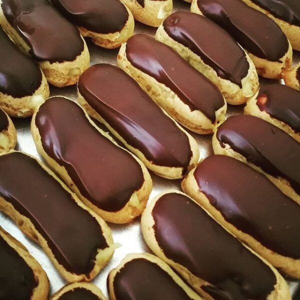 Chocolate Eclairs - Cakes And Colors